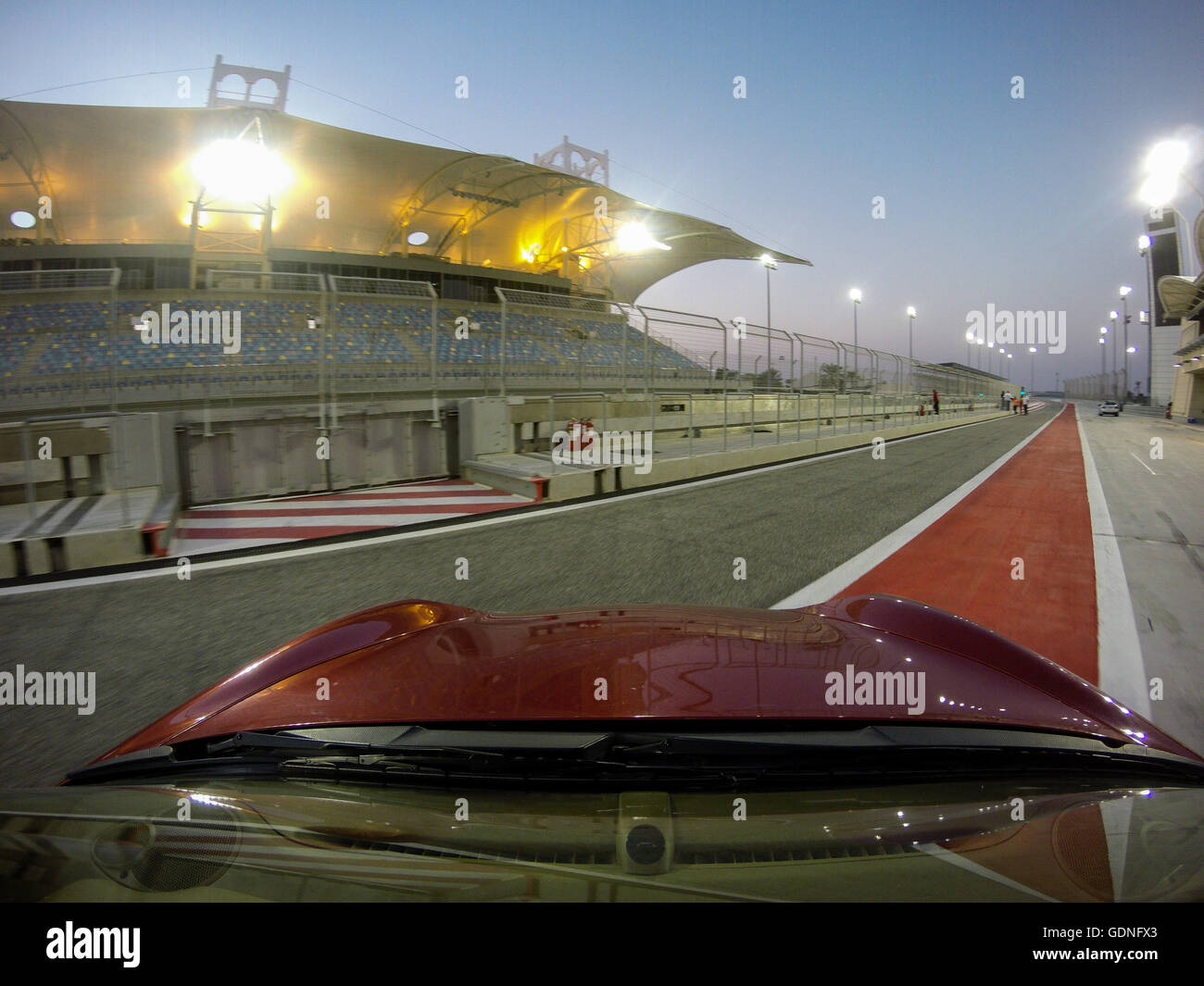 Sports car on the Bahrain Race Track Stock Photo - Alamy