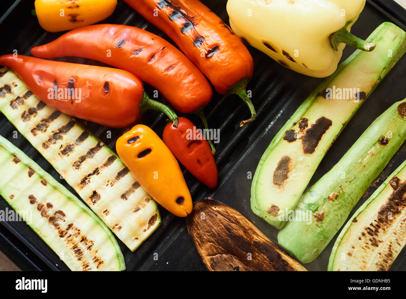 Top view showing vegetables on a grill, roasting Stock Photo - Alamy