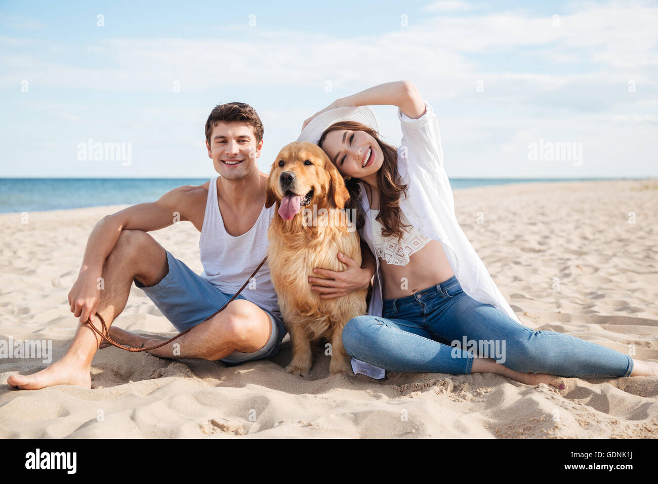 Portrait couple dog sitting on hi-res stock photography and images - Alamy