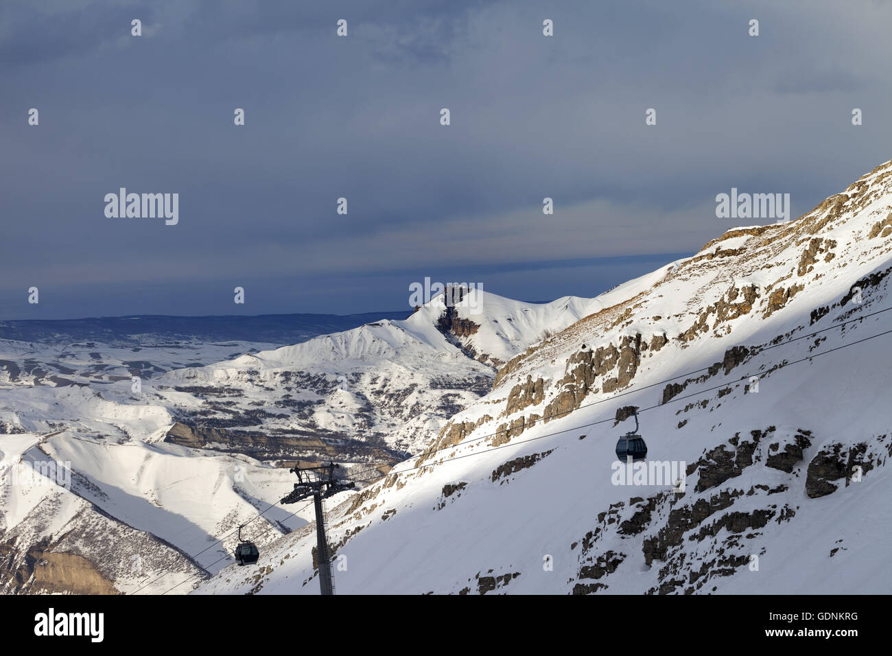 Gondola lift on ski resort at sun evening. Greater Caucasus, Mount ...