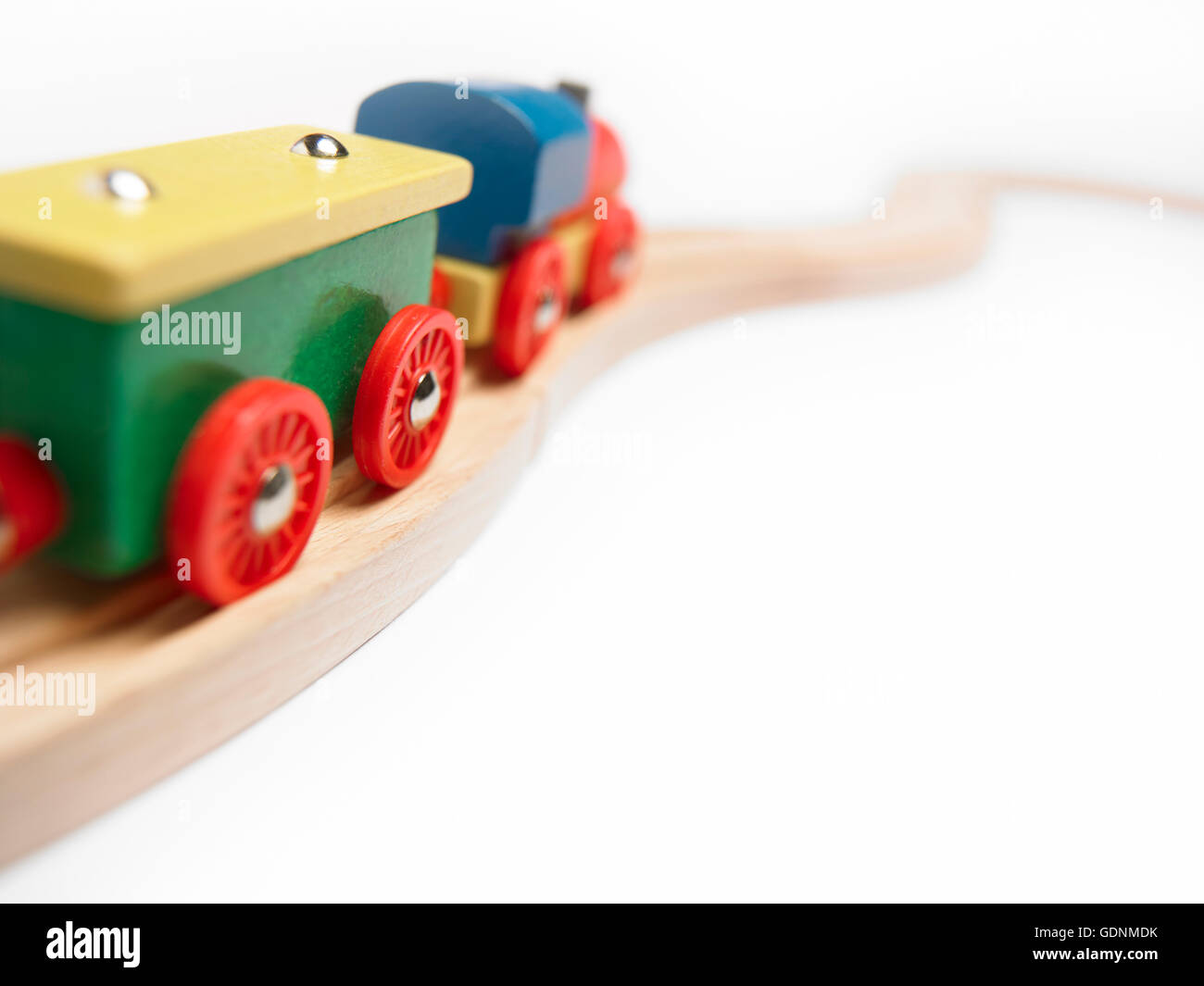 Colorful wooden toy train detail isolated on white. Horizontal Stock ...