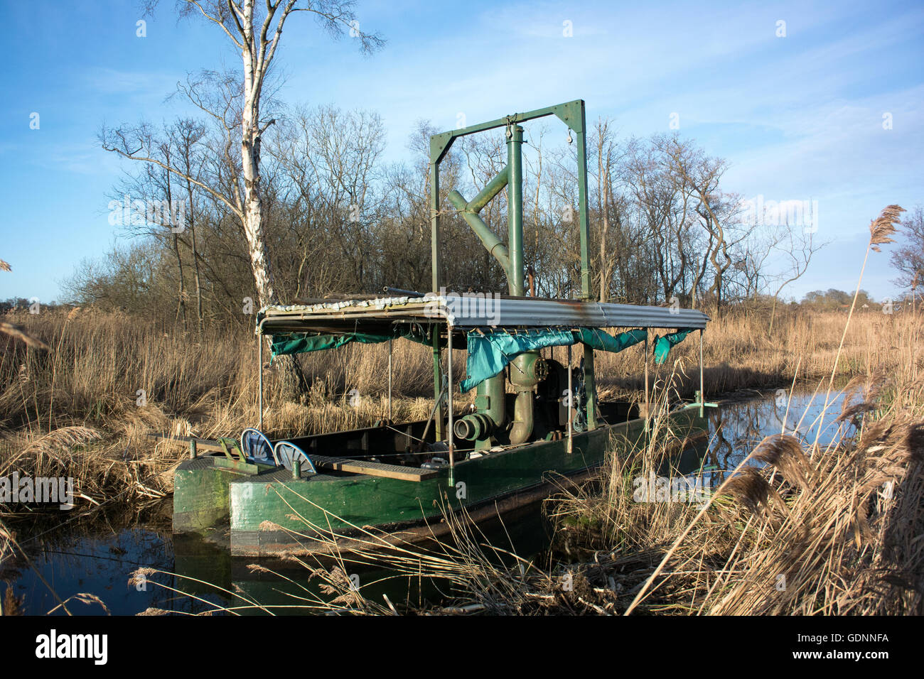 Steam powered reed cutting machine, Bure Marshes, Norfolk Stock Photo ...