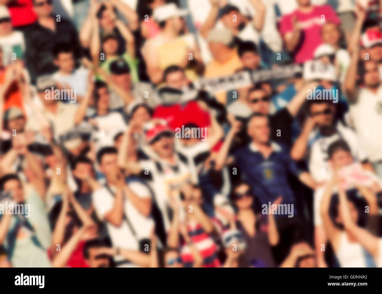 Blurred background of crowd of people at the stadium Stock Photo - Alamy