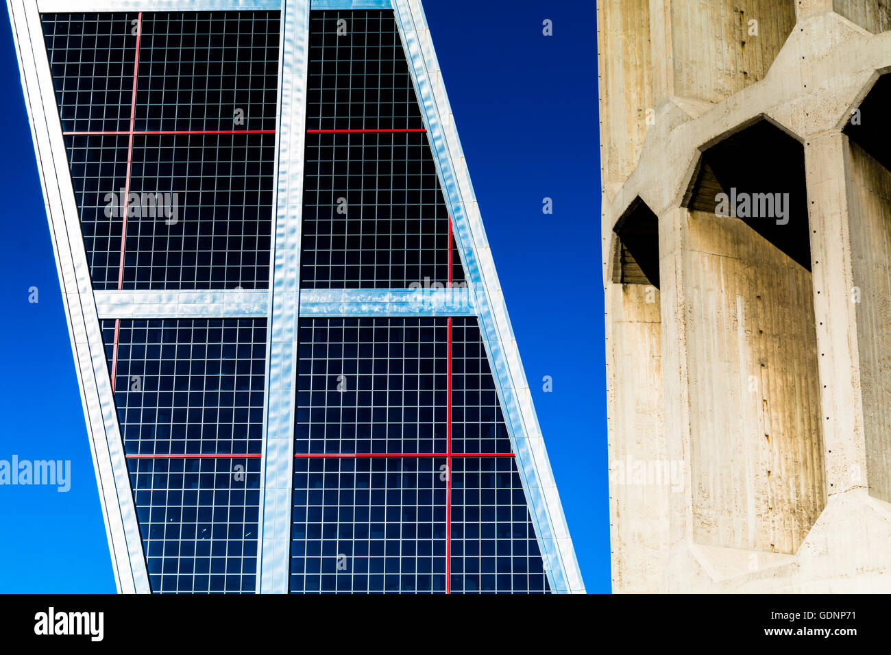Front View Of Modern Bend Tower Glass Facade and Old Water Tower ...