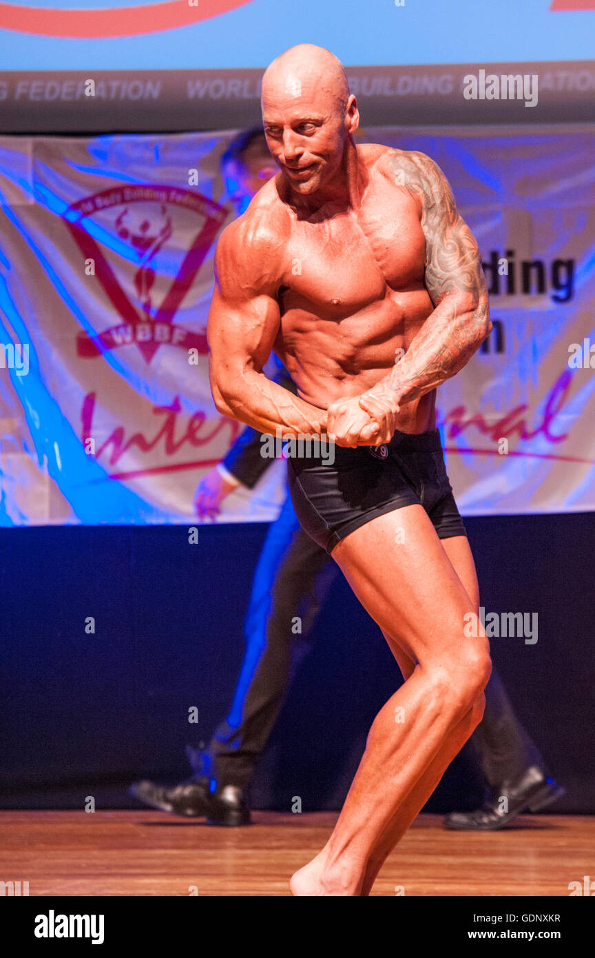 Male bodybuilder flexing his biceps hi-res stock photography and images ...