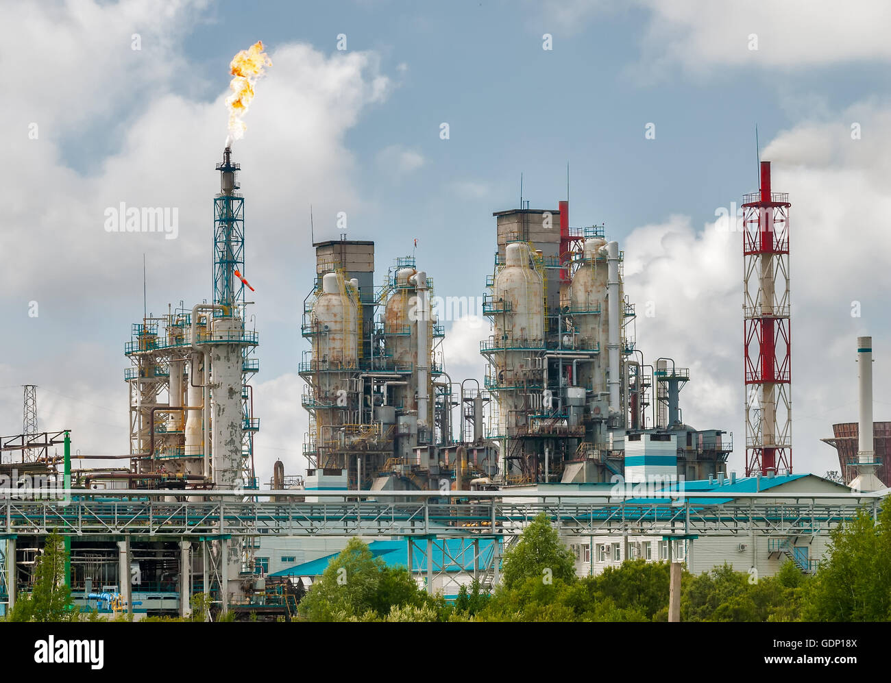 Oil refinery building industry Stock Photo - Alamy