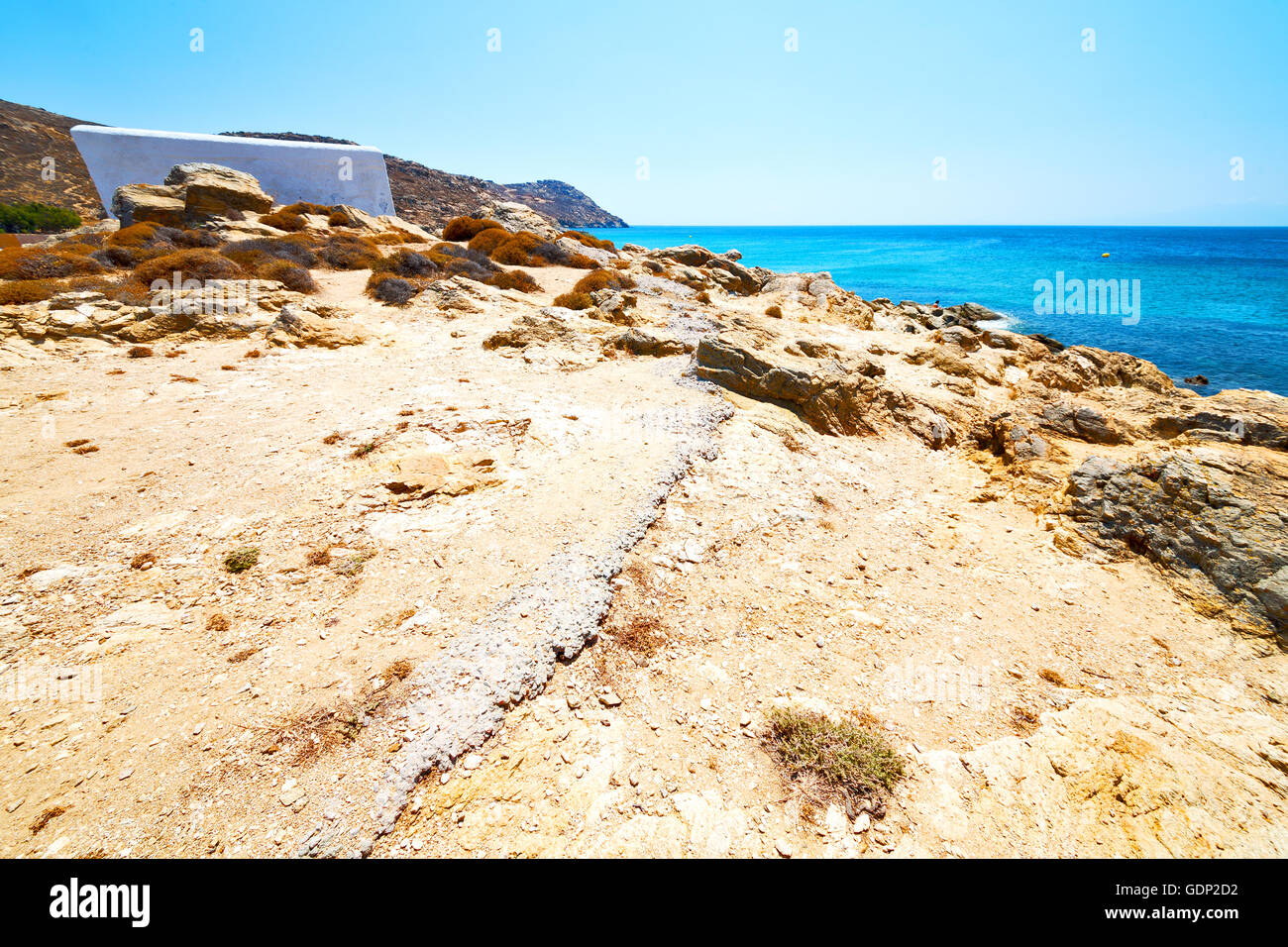 in greece the mykonos island rock sea and beach sky Stock Photo - Alamy