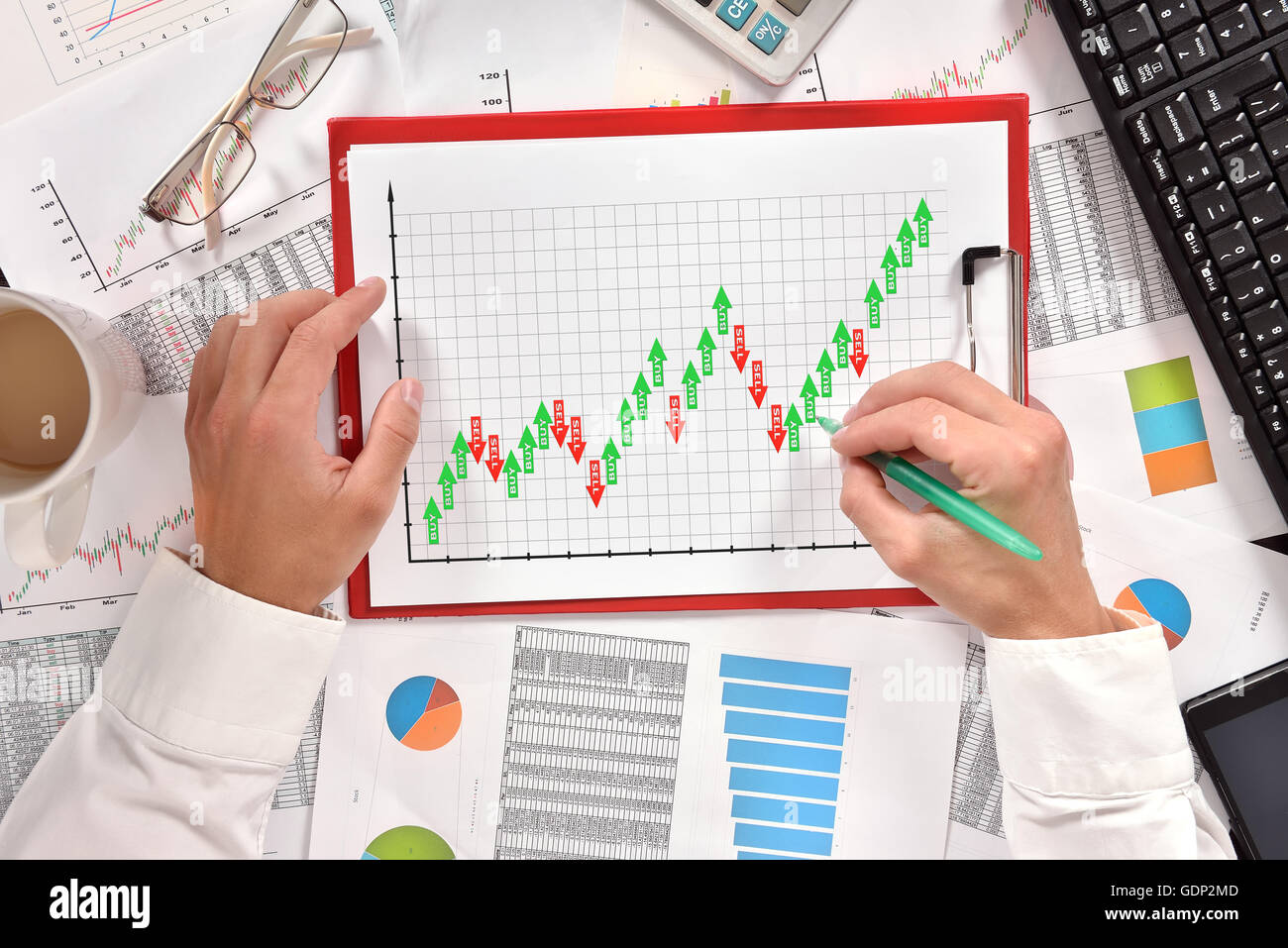 hand businessman drawing stock chart in clipboard Stock Photo - Alamy