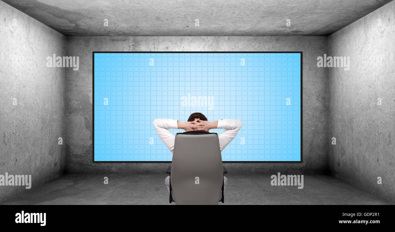 young businessman looking on blank plasma panel Stock Photo - Alamy