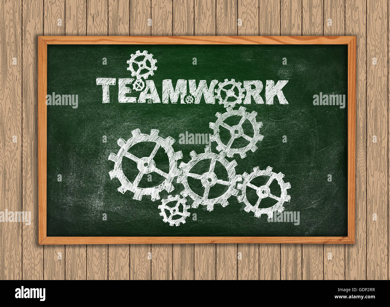 Blackboard with drawing teamwork concept on a wooden wall Stock Photo ...