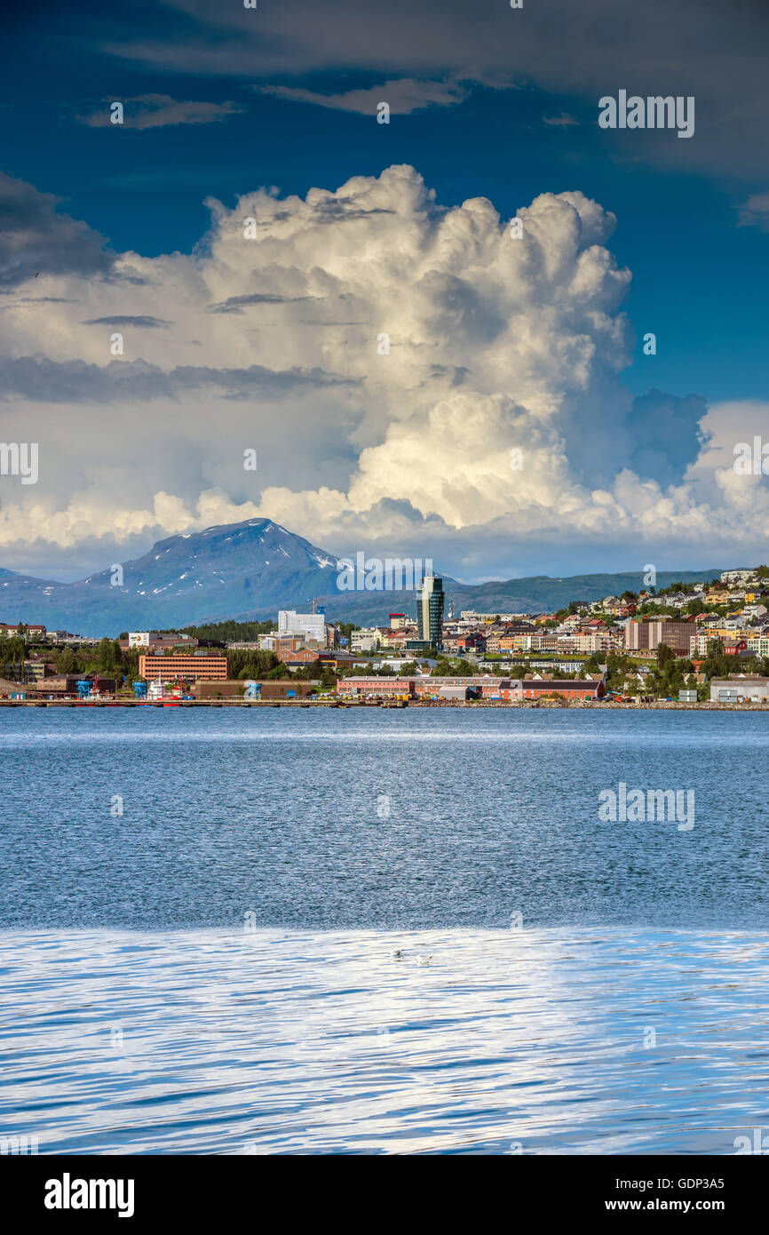 Narvik city seen across Ofotfjorden with cumulonimbus thunder clouds ...