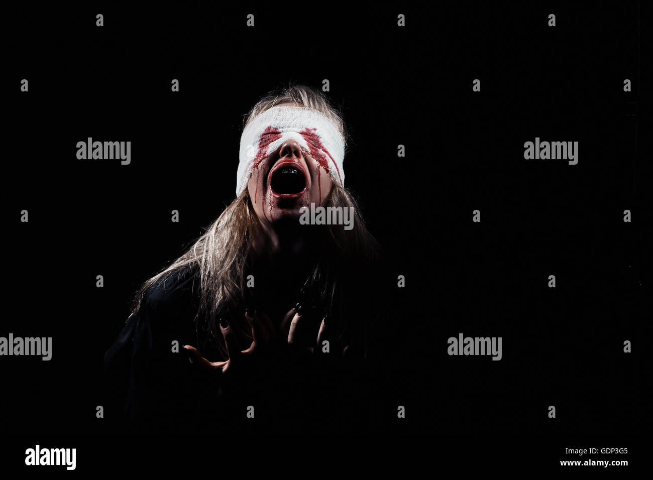 Woman crying blood hi-res stock photography and images - Alamy