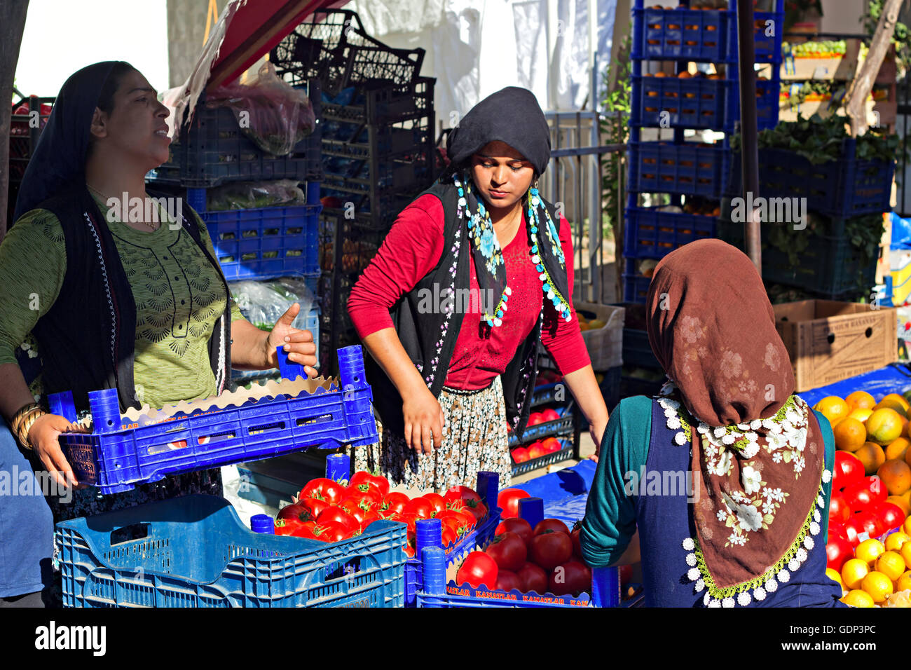 Turkish women preparing their stall at an outdoor street market Stock ...