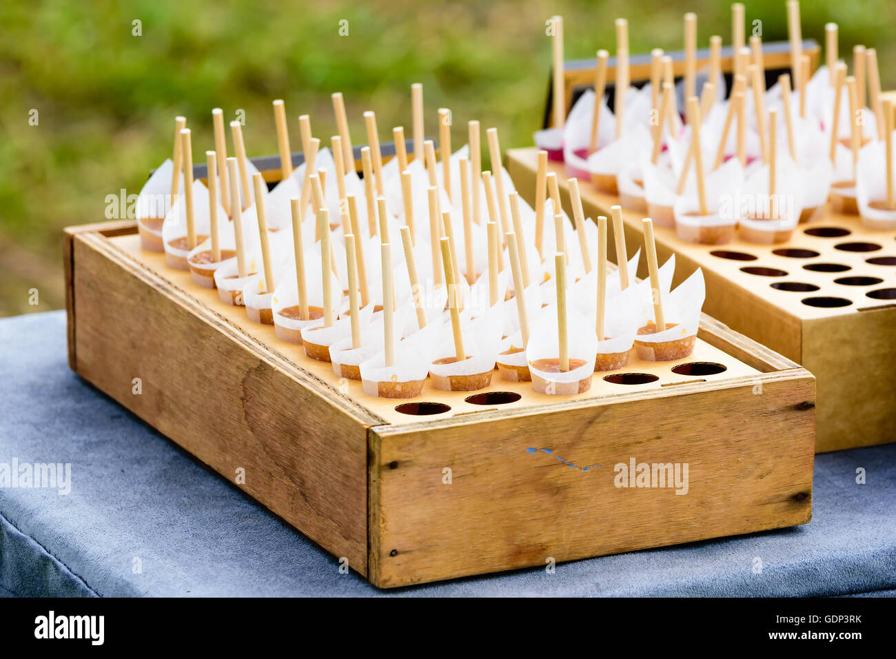 Collection of butterscotch cones candy in a makeshift display made of a ...