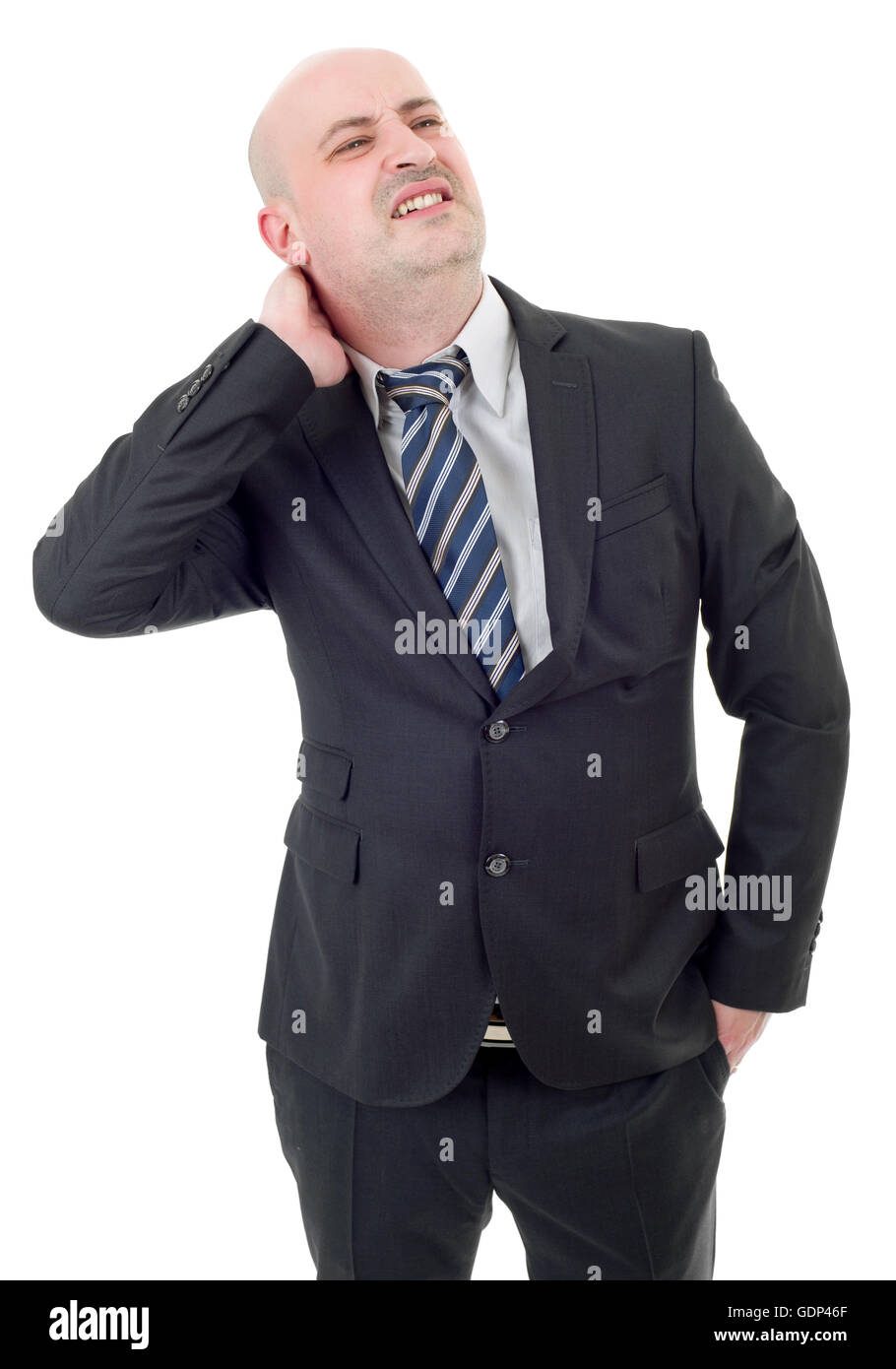 Young businessman with strong back pain, isolated on white background ...