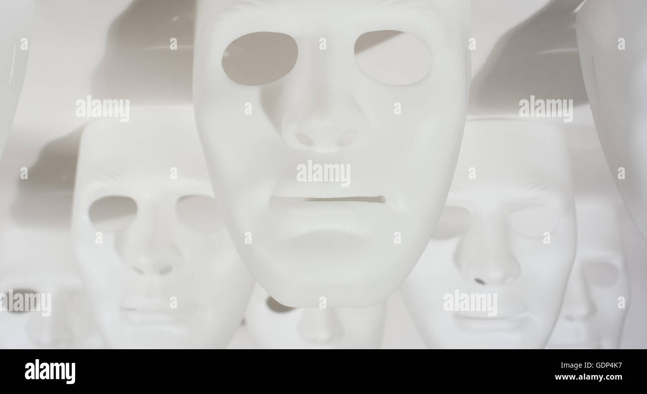 Worry metaphor white masks Stock Photo - Alamy