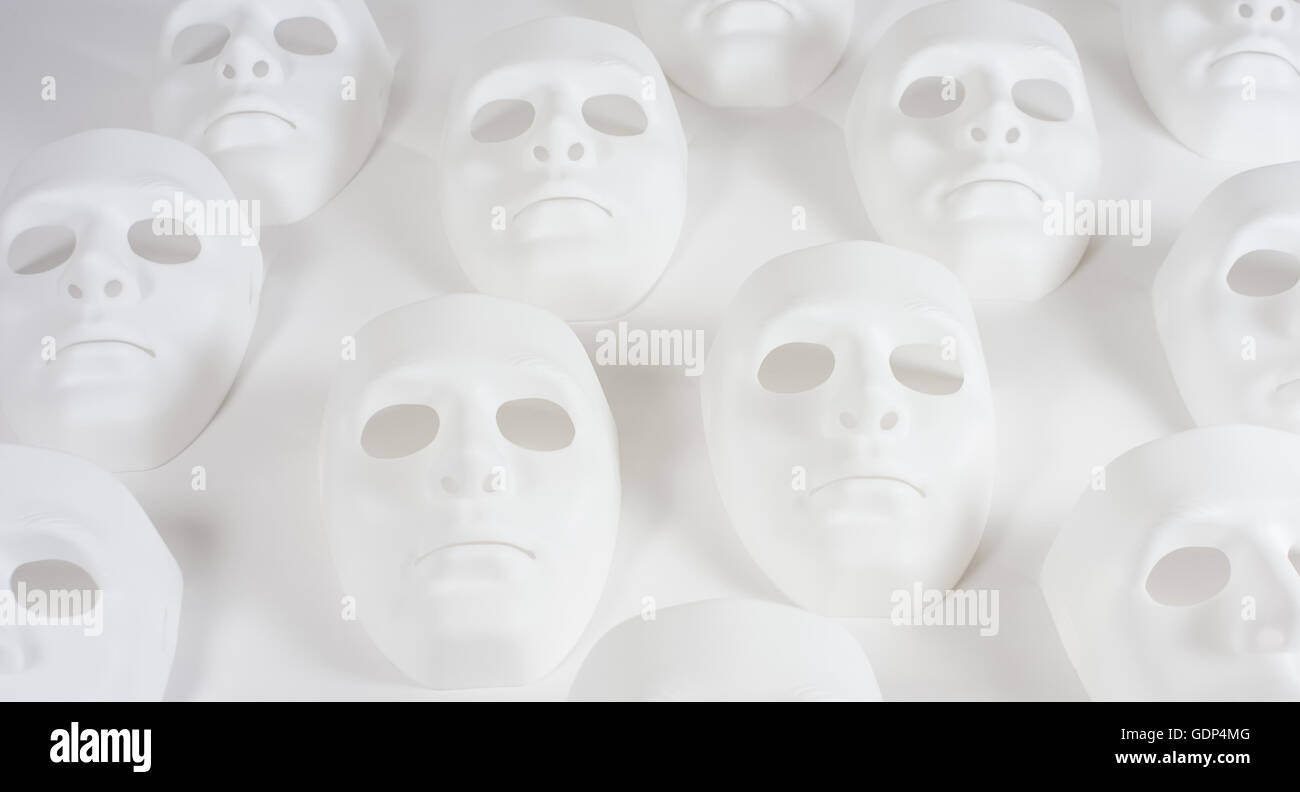 Carnival white sad masks Stock Photo - Alamy
