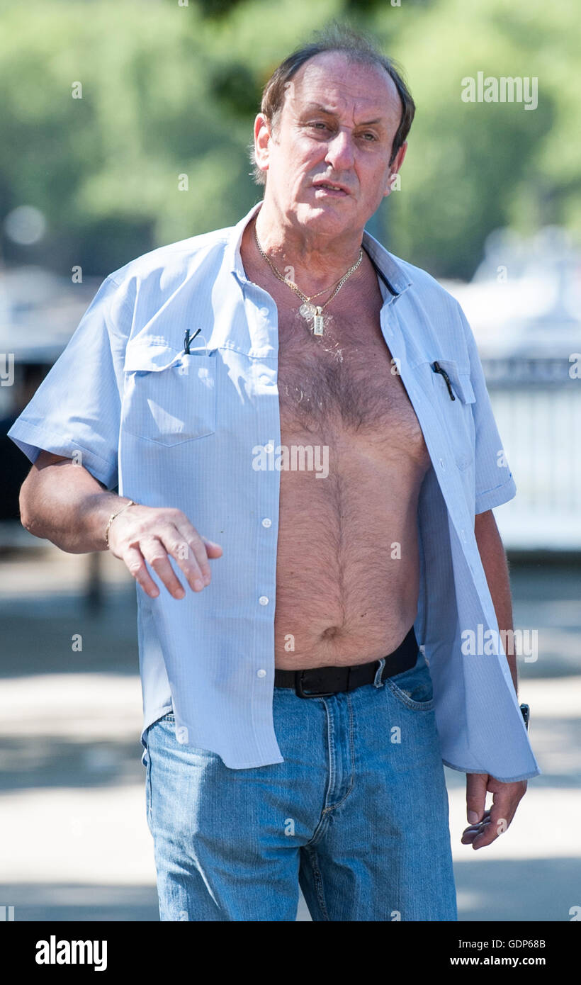 A man enjoys the hot weather along the Southbank in London, as Britain ...