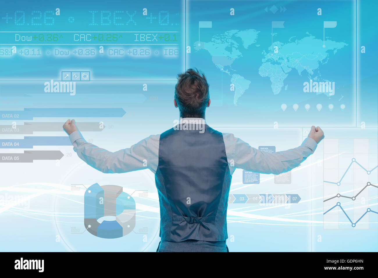 Man looking at data on graphical screen, fists clenched, rear view ...