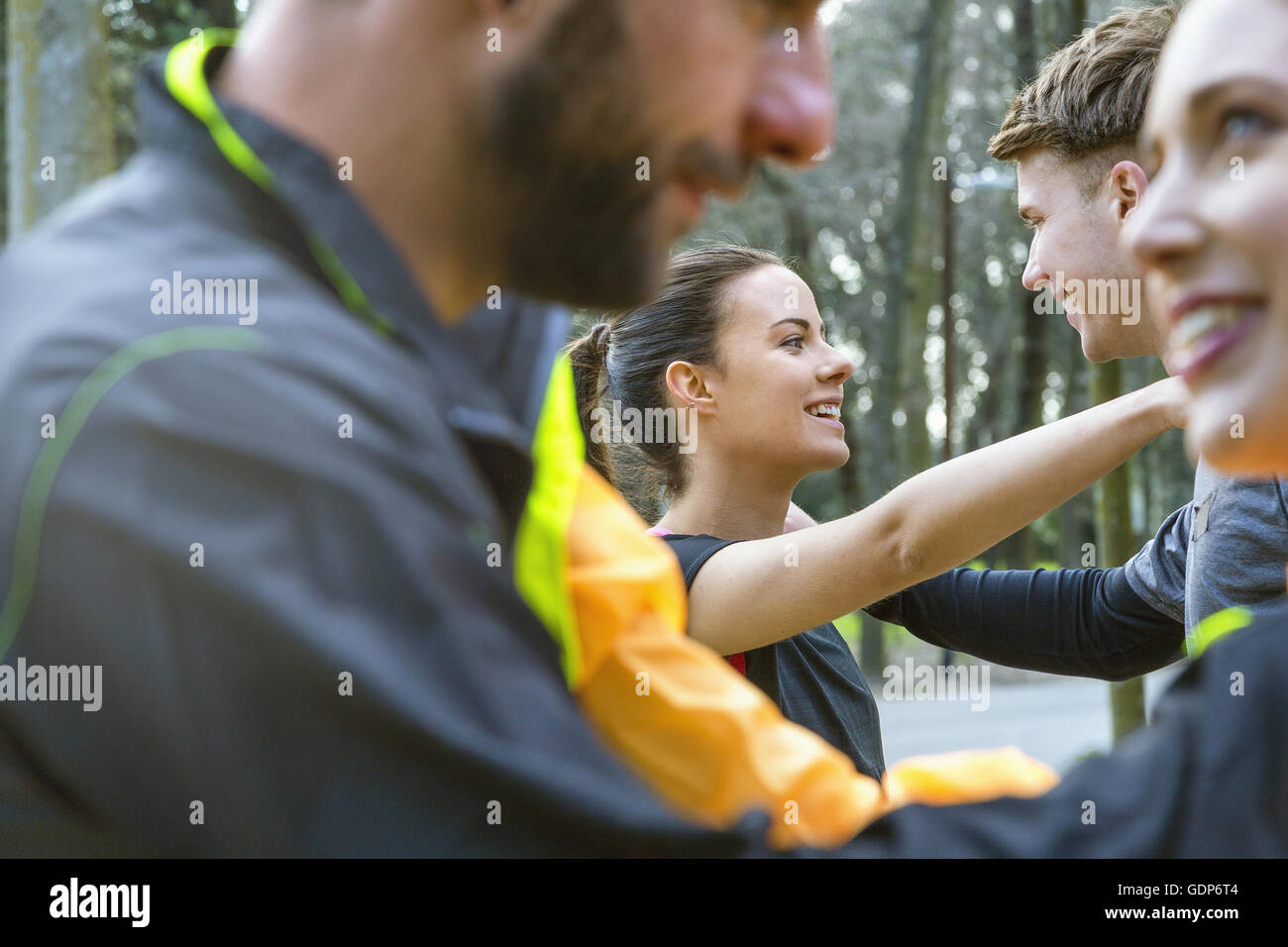 Friends greeting each other, outdoors Stock Photo - Alamy