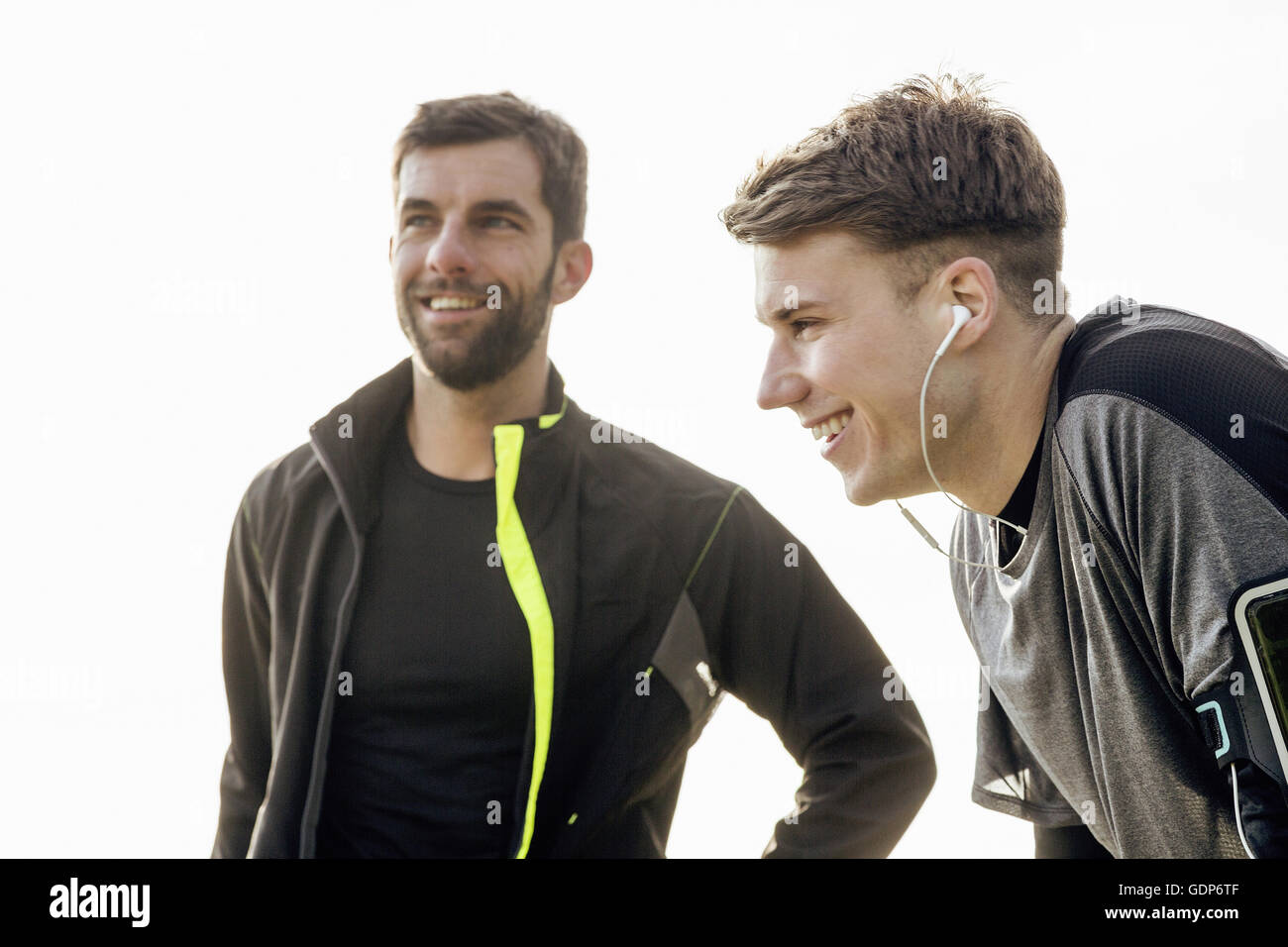 Two male friends exercising outdoors Stock Photo - Alamy