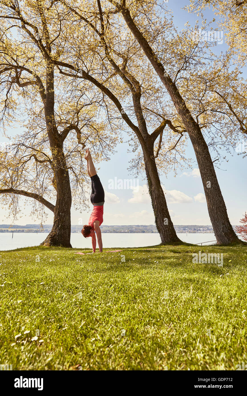 Girl doing handstand hi-res stock photography and images - Alamy
