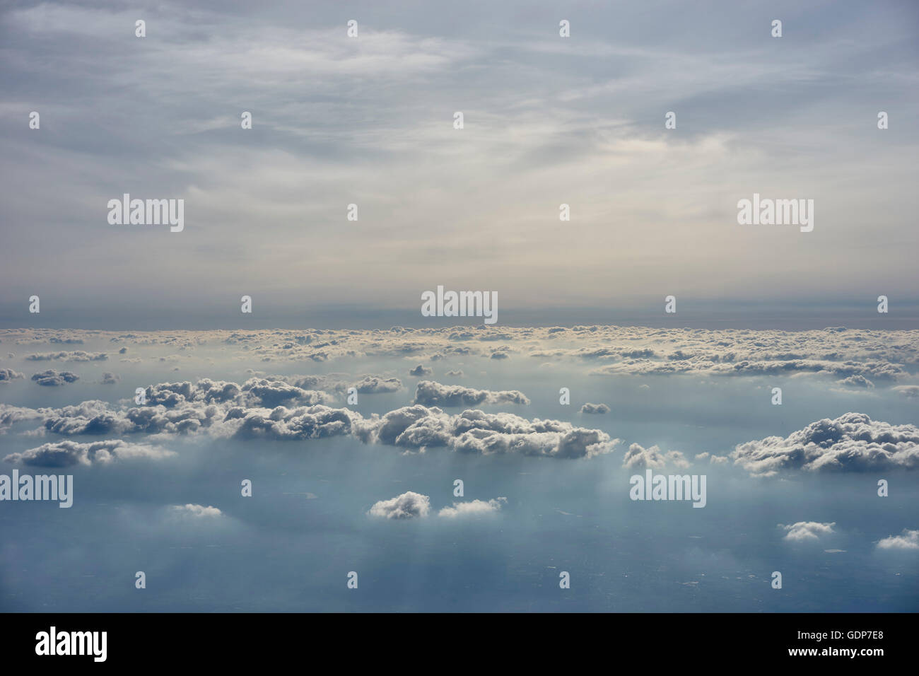 Aerial view above and below clouds Stock Photo - Alamy