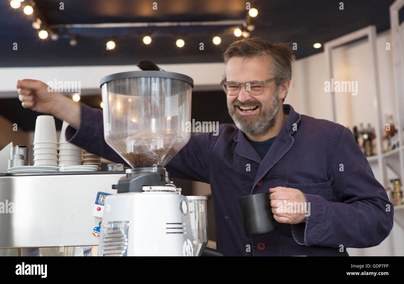 Cafe owner coffee hi-res stock photography and images - Alamy