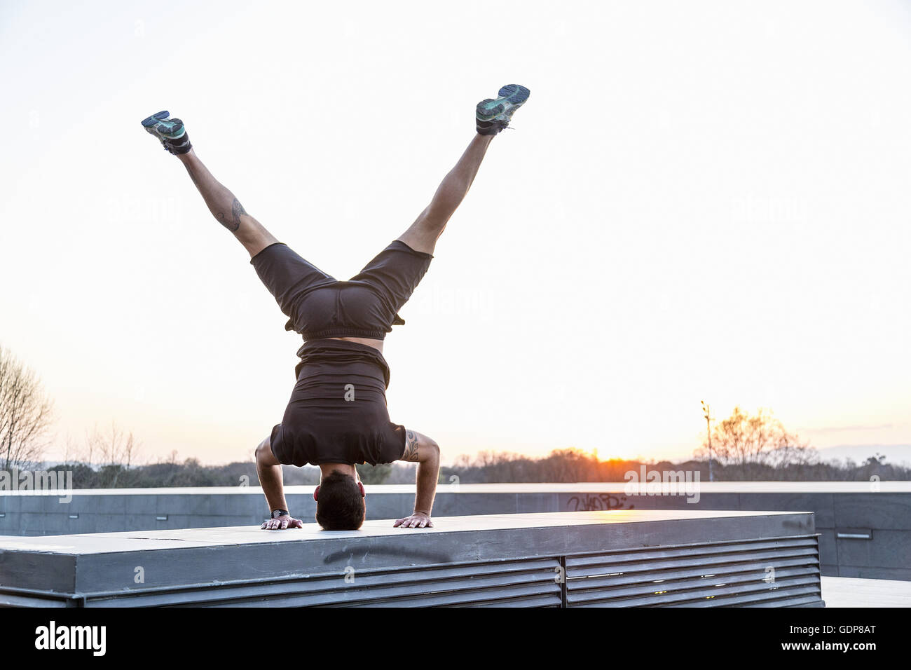 Male balancing head hi-res stock photography and images - Alamy