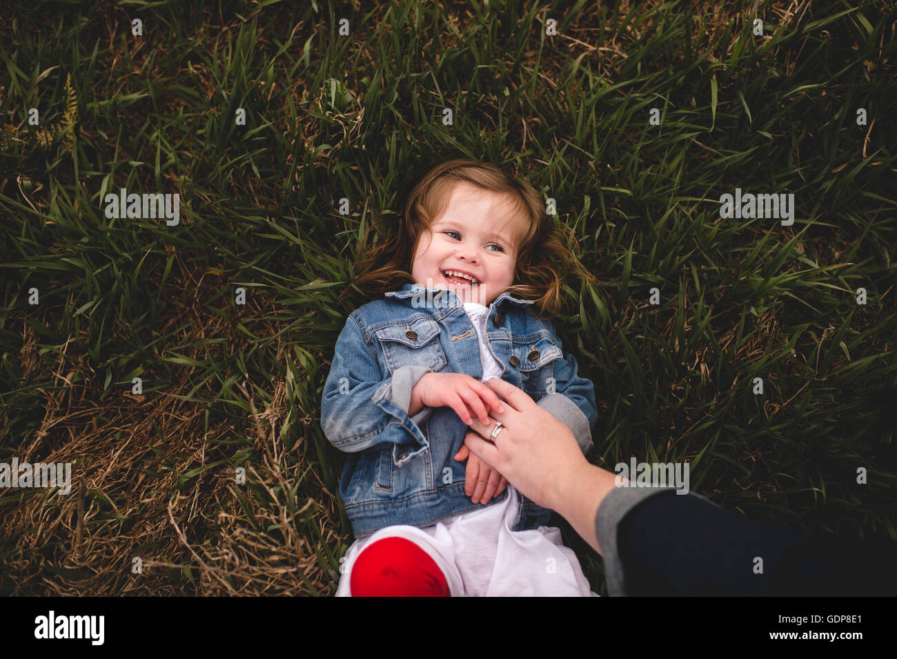 Child being tickled hi-res stock photography and images - Alamy