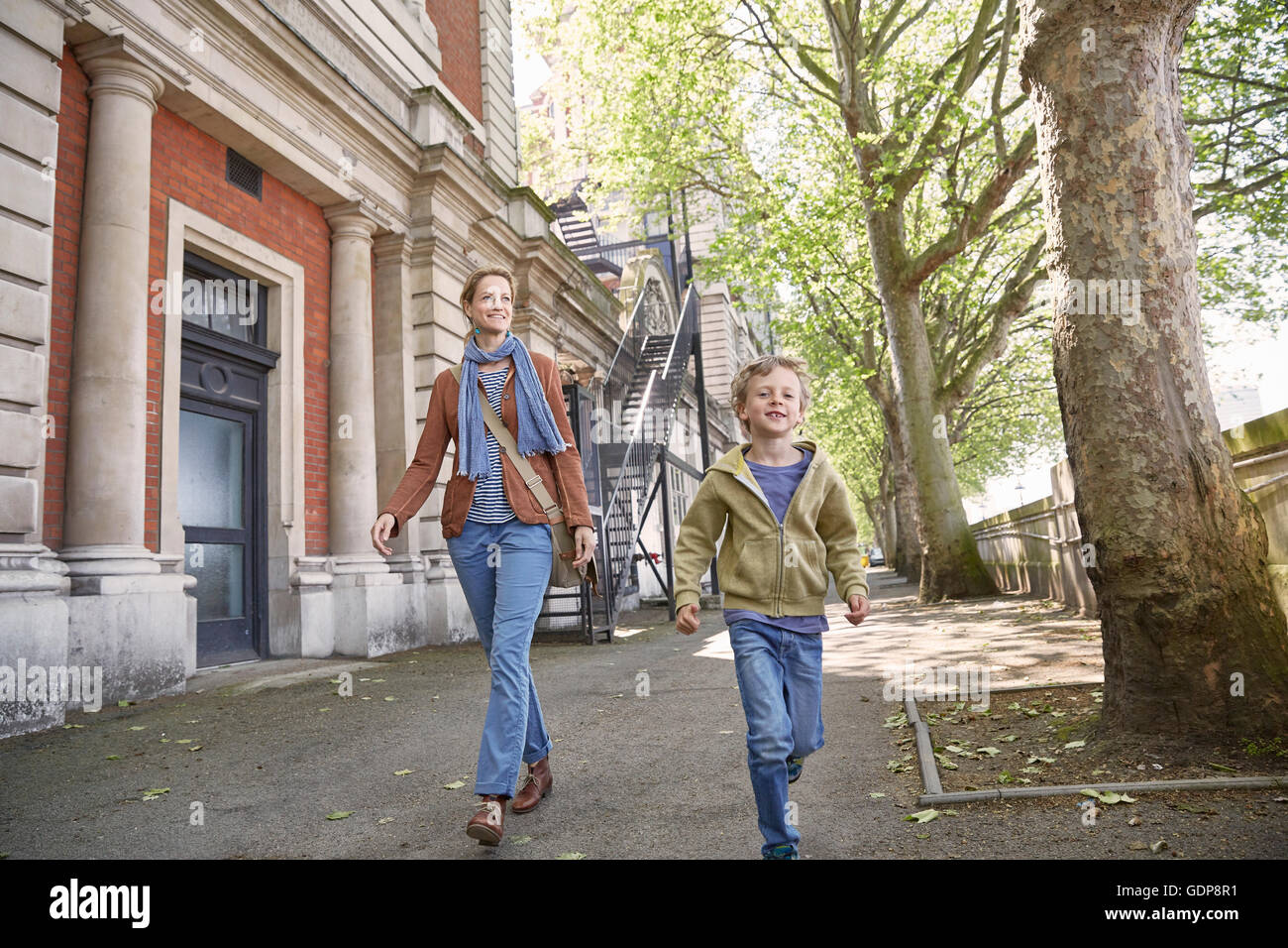 Boy street walking hi-res stock photography and images - Alamy