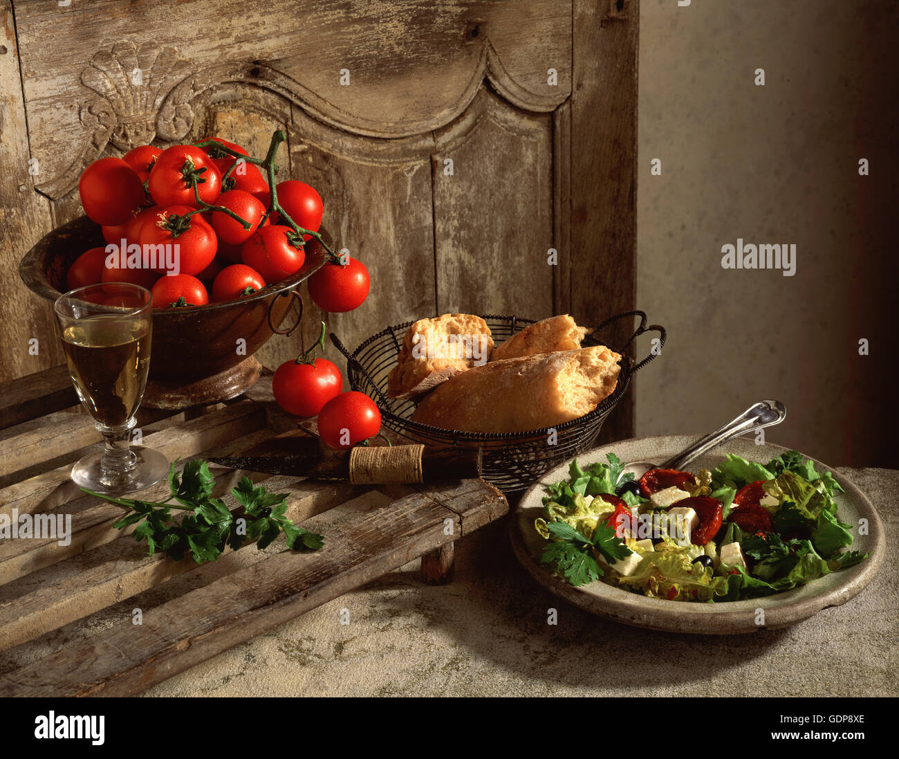 Traditional display of mediterranean food, tomatoes, ciabatta bread ...