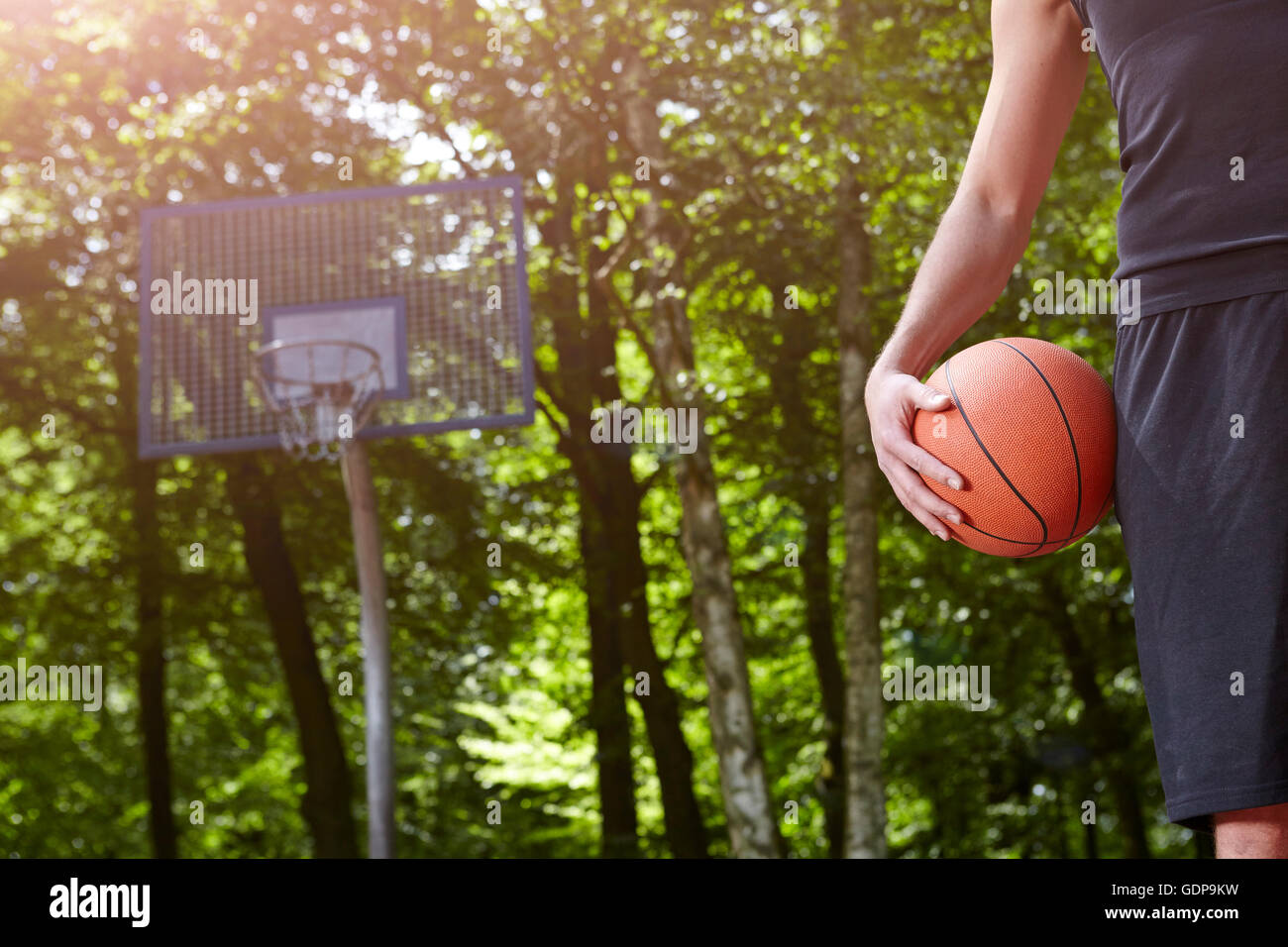 Hand holding ball in front hi-res stock photography and images - Alamy