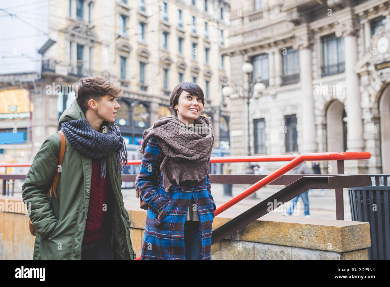 Sisters walking on street hi-res stock photography and images - Alamy