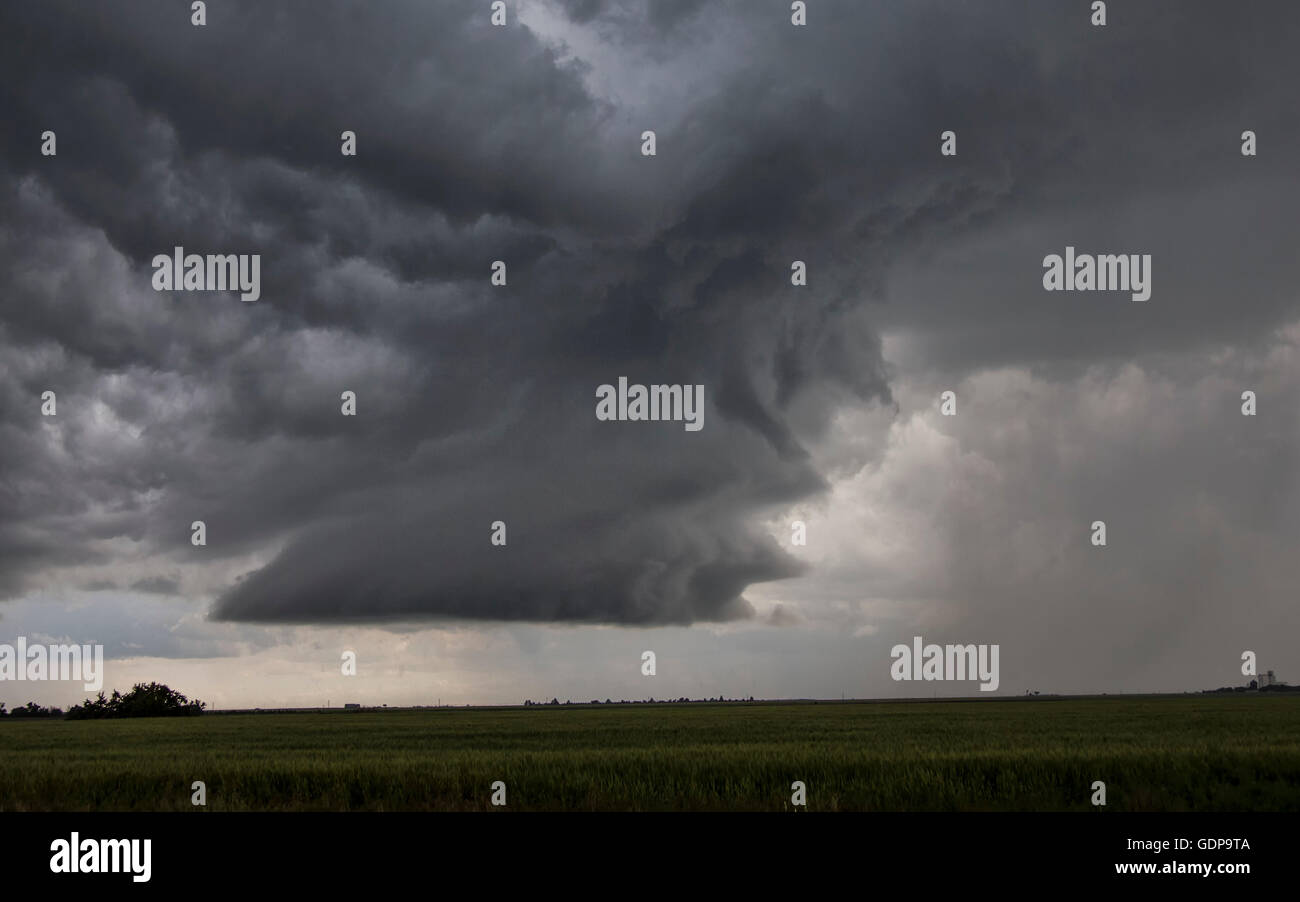 Rotating supercell clouds over field Stock Photo - Alamy