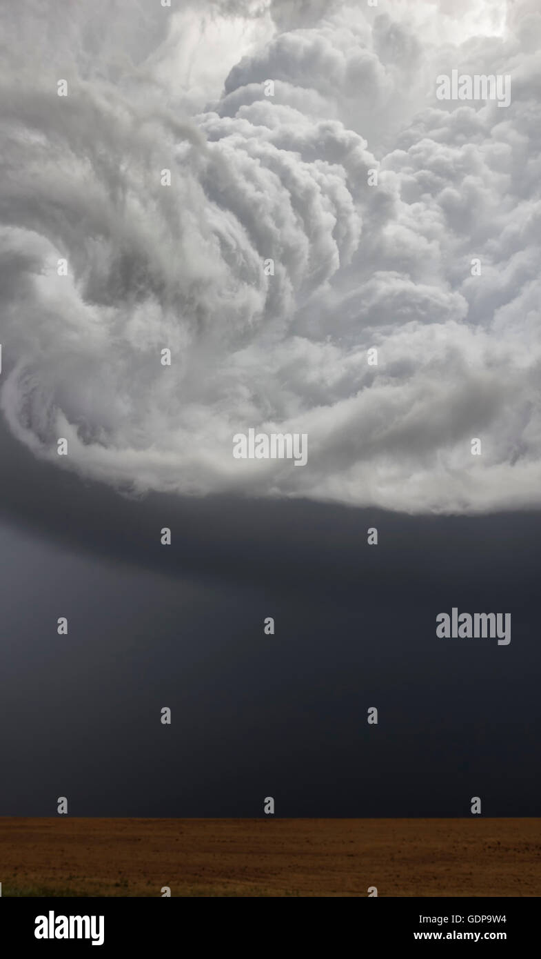 A violently rotating updraft creates a corkscrew appearance from the ...