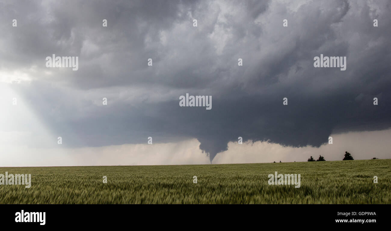 Crepuscular rays wrap around the rear flank downdraft of tornadic ...
