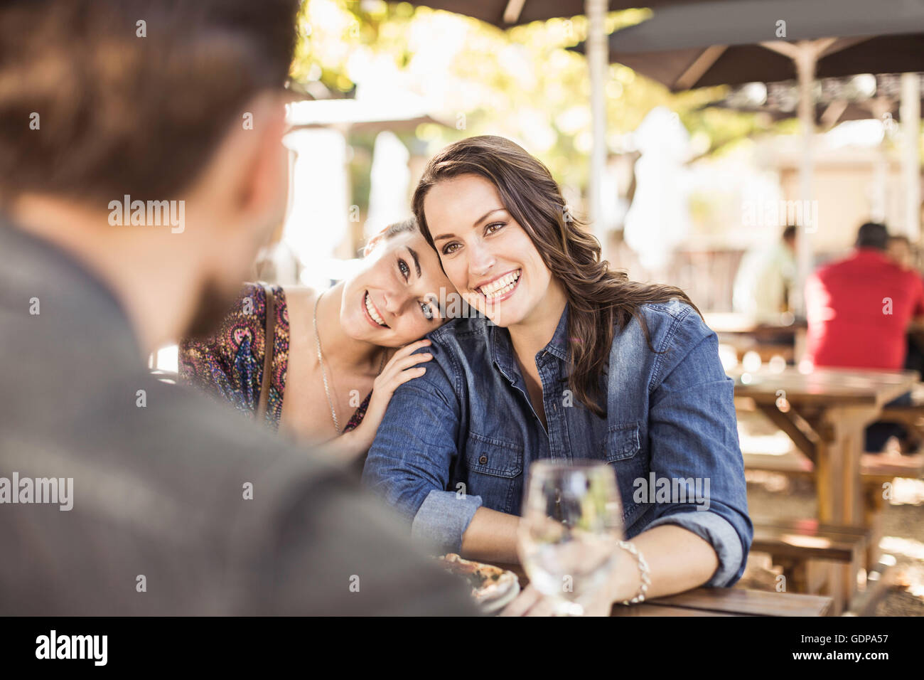 Three friends hugging hi-res stock photography and images - Alamy