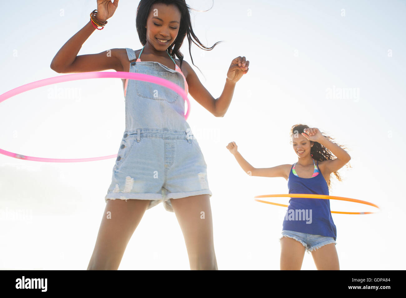 Women using hula hoop Stock Photo - Alamy