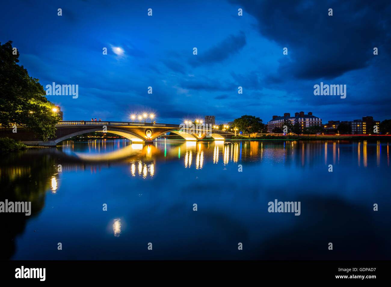 The moon over the John W Weeks Bridge and Charles River at night, in ...