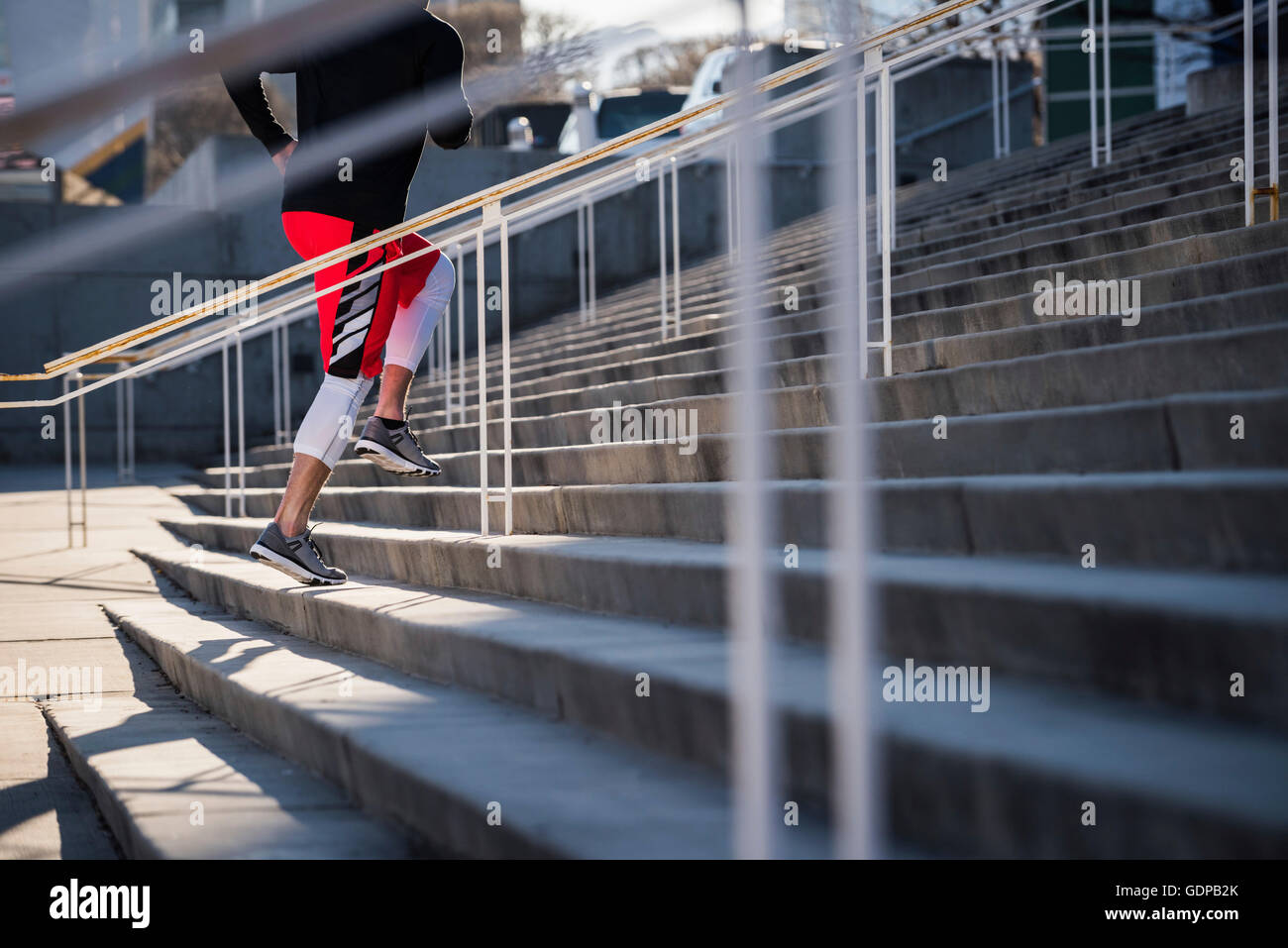 Man running up stairs hi-res stock photography and images - Alamy