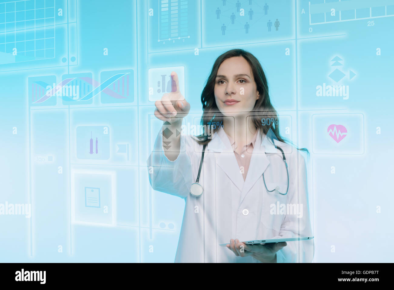 Female doctor holding digital tablet, touching graphical screen Stock ...