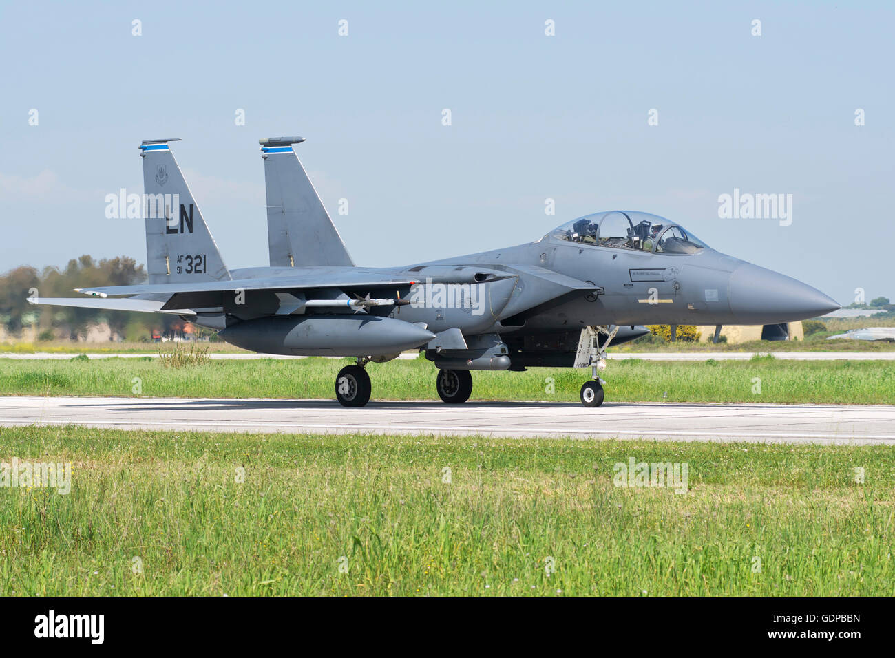A U.S. Air Force in Europe (USAFE) F-15E Strike Eagle on the runway in ...