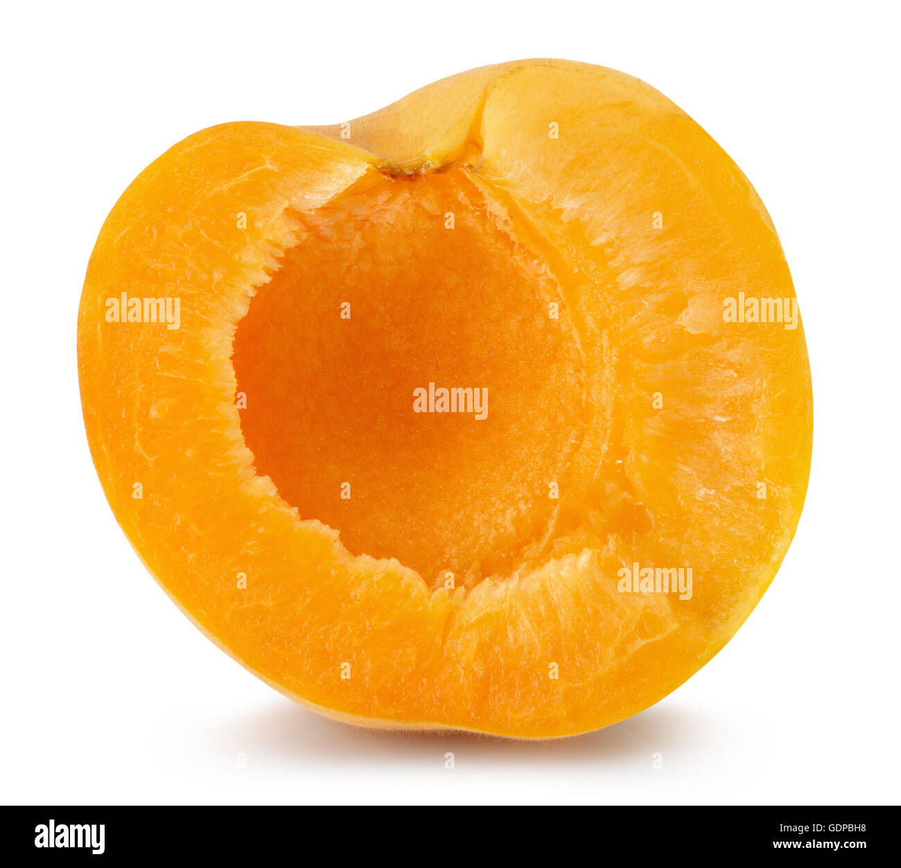 half of apricot isolated on the white background Stock Photo - Alamy