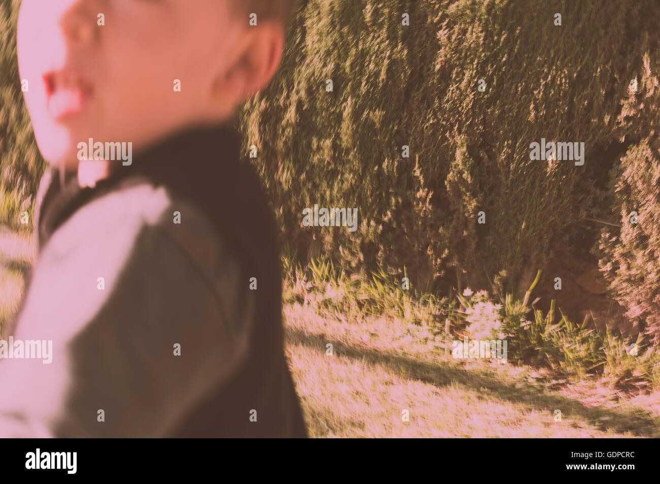 blurred boy in motion Stock Photo - Alamy