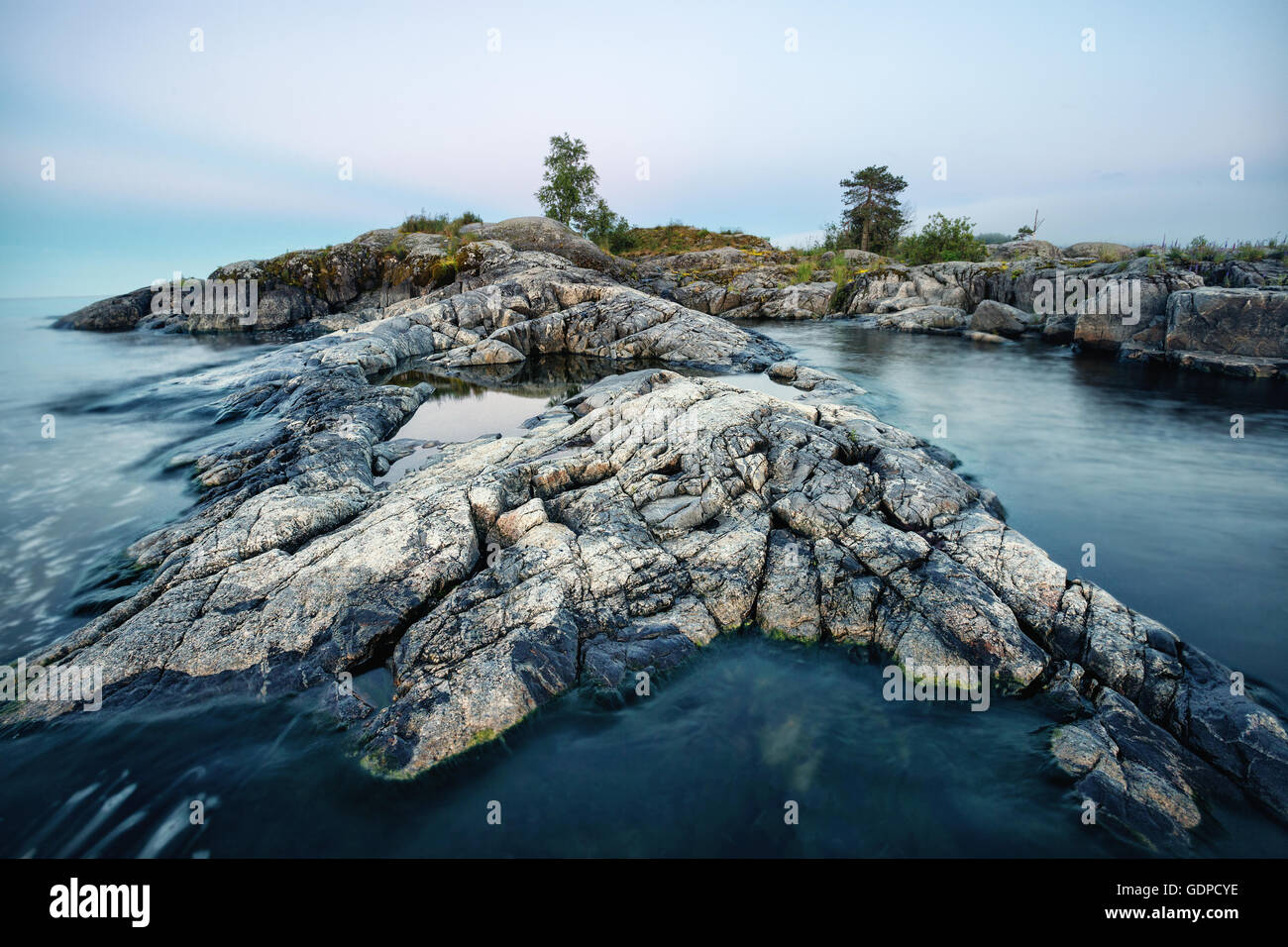 Mysterious stone coast of the island at dawn Stock Photo - Alamy