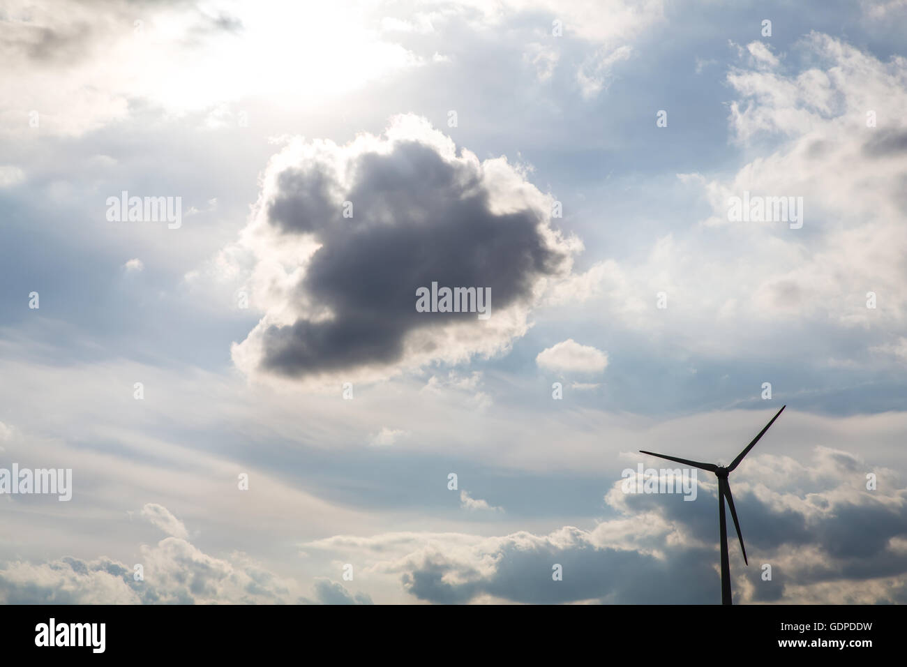 Wind turbine under a dramatic sky Stock Photo - Alamy