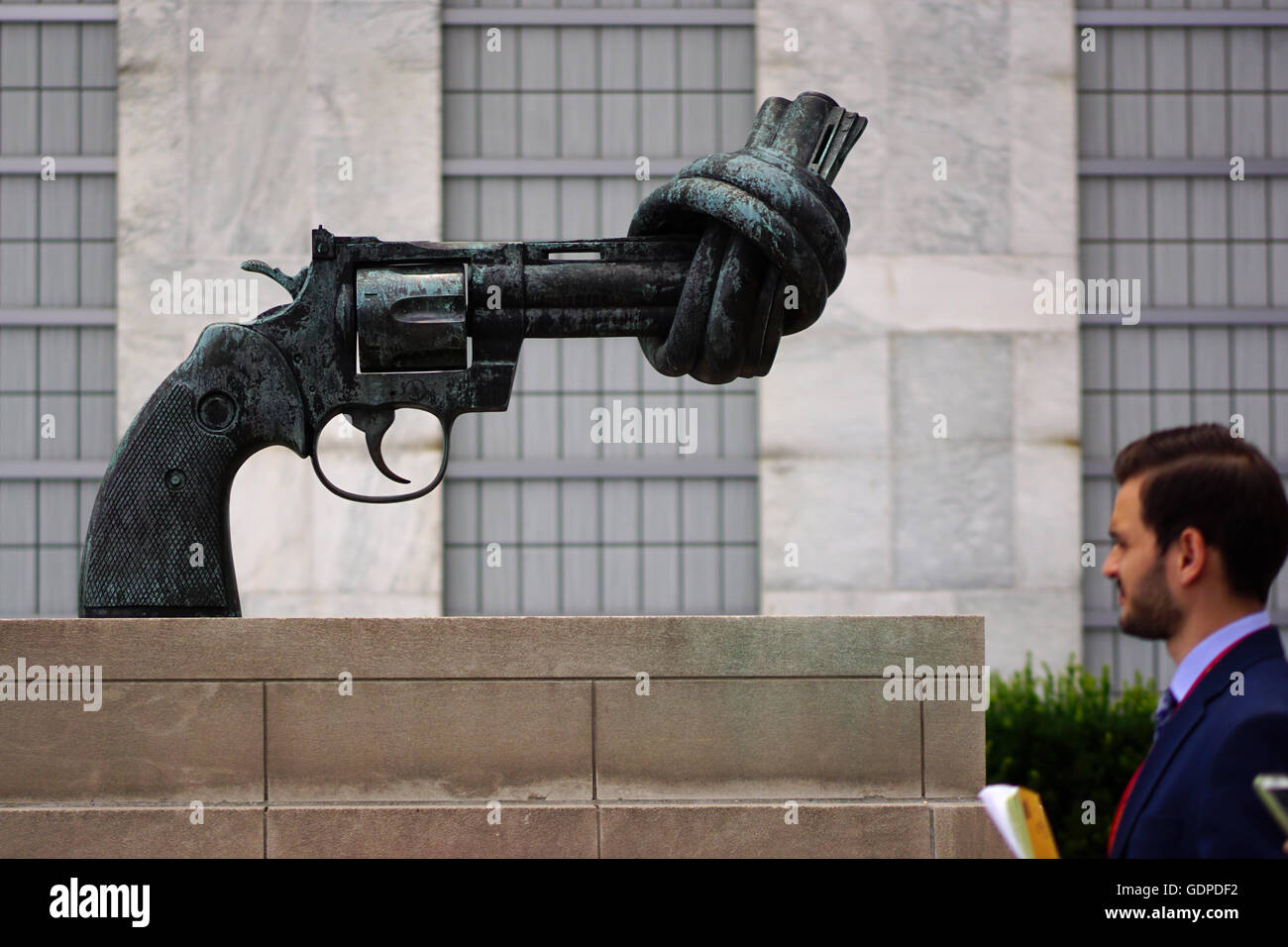 bronze sculpture of an oversized Colt Python .357 revolver with a ...