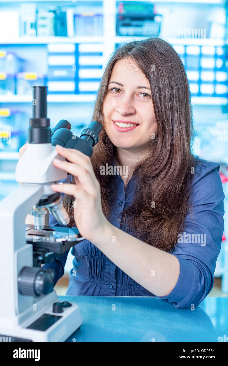 laboratory assistant at the microscope Stock Photo - Alamy