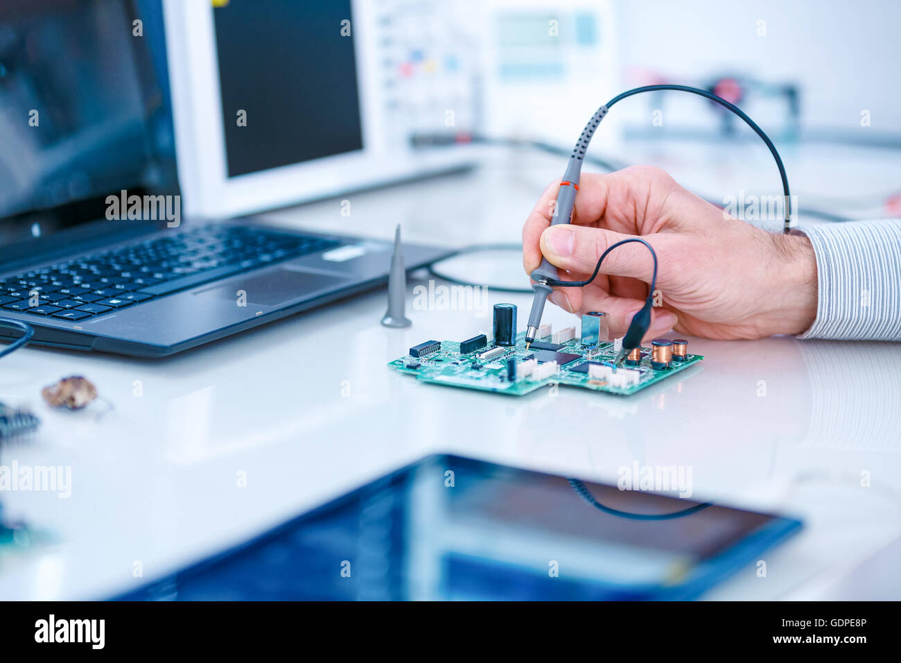 Using the microscope electronics laboratory Stock Photo - Alamy